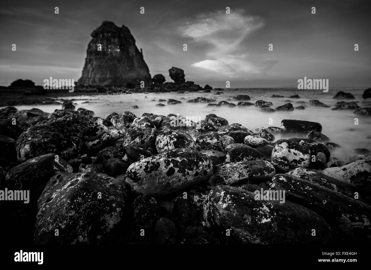 Rocks of all sizes at Papuma Beach In Java, Indonesia Stock Photo - Alamy