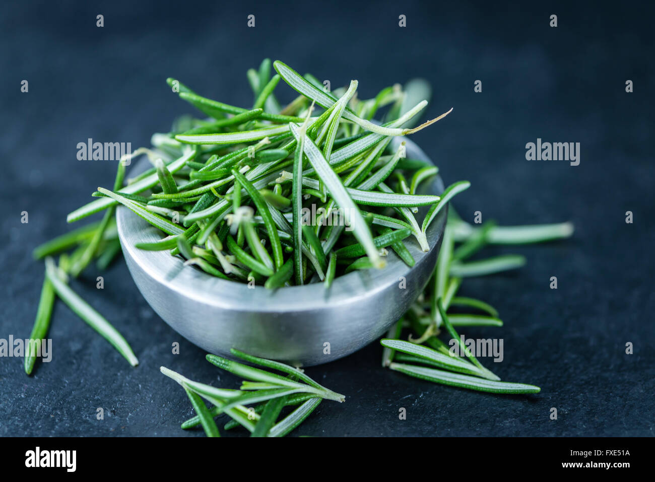 Rosemary (close-up shot; selective focus) on a vintage background Stock ...