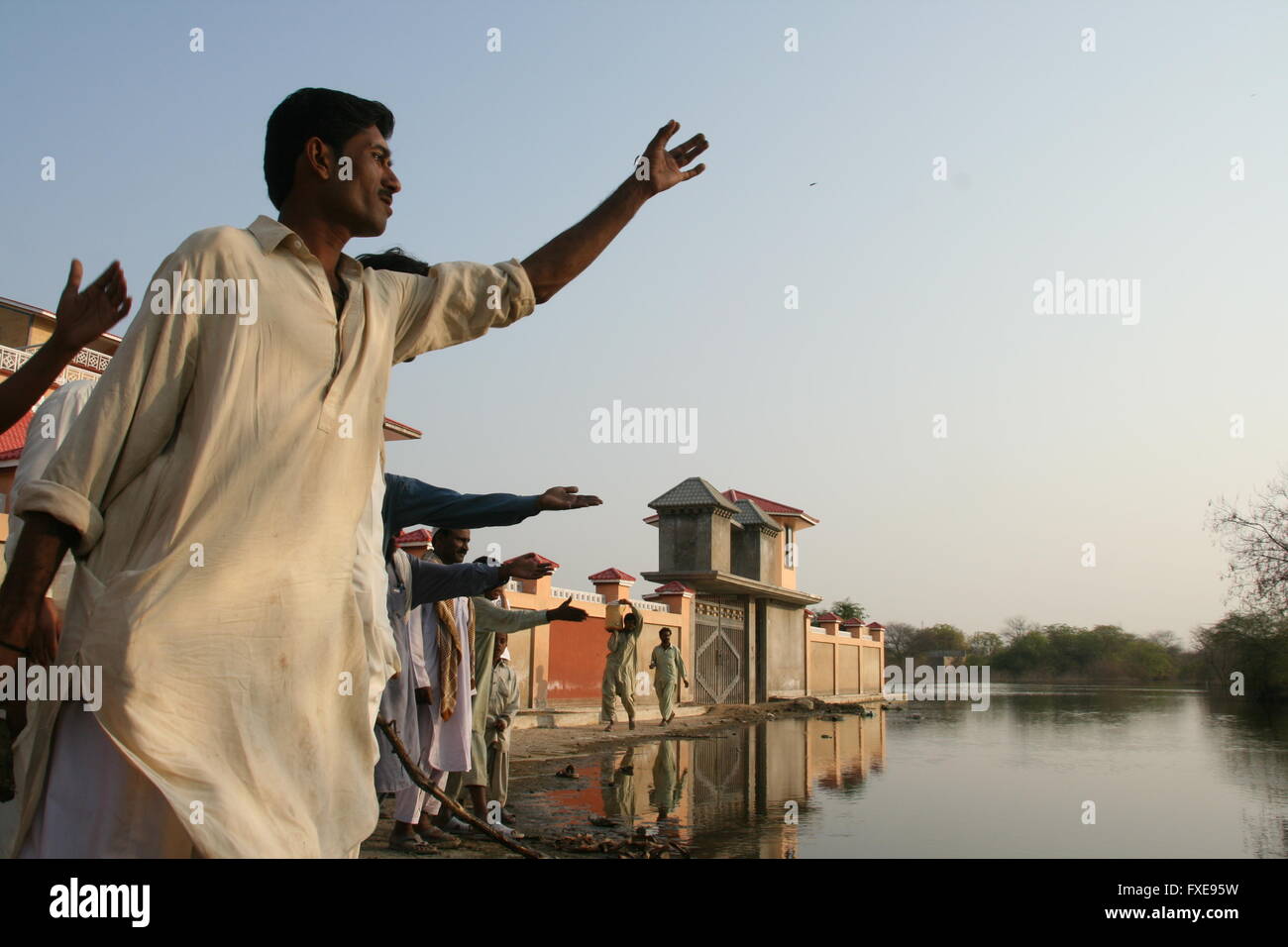 people after flood disaster, houses in the water Stock Photo - Alamy
