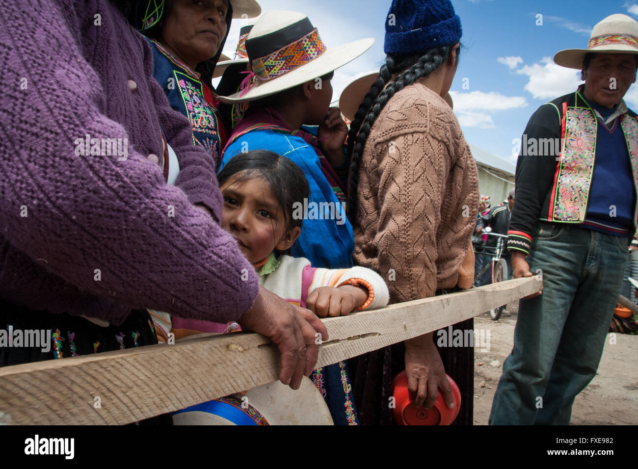 Bolivia, men and women celebrating a holiday on the street in ...