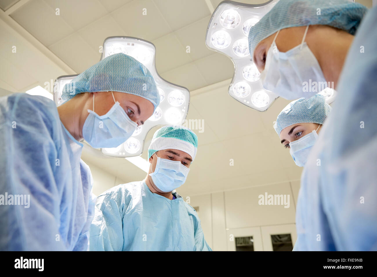 group of surgeons in operating room at hospital Stock Photo - Alamy