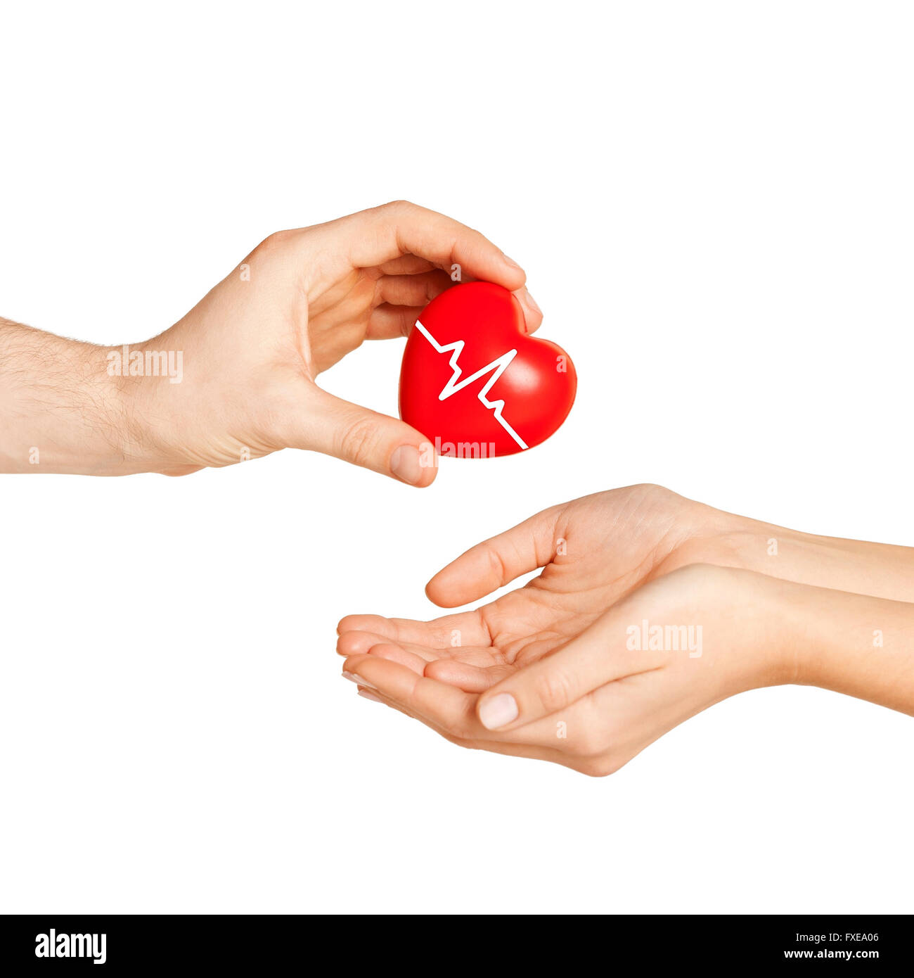 man hand giving red heart to woman Stock Photo - Alamy
