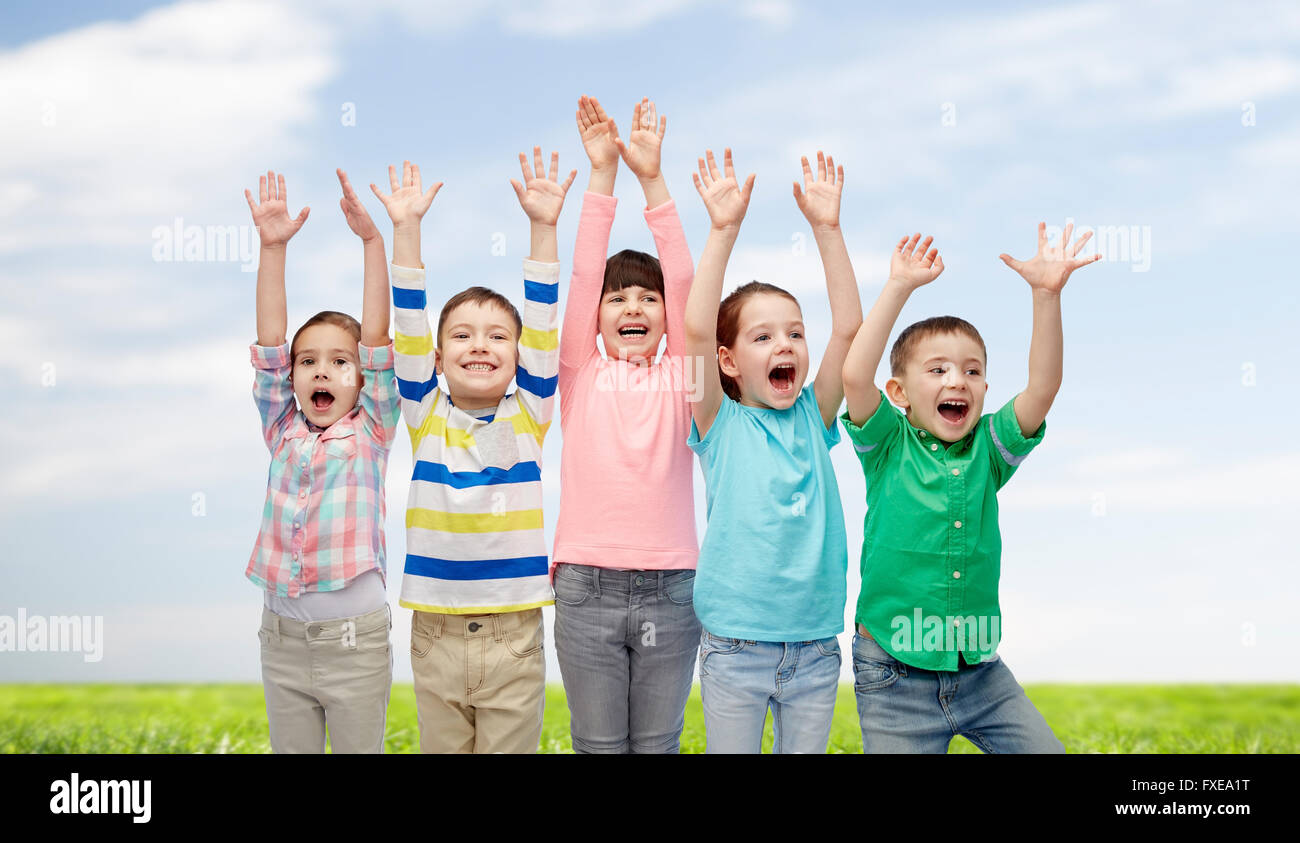 happy friends celebrating victory Stock Photo - Alamy