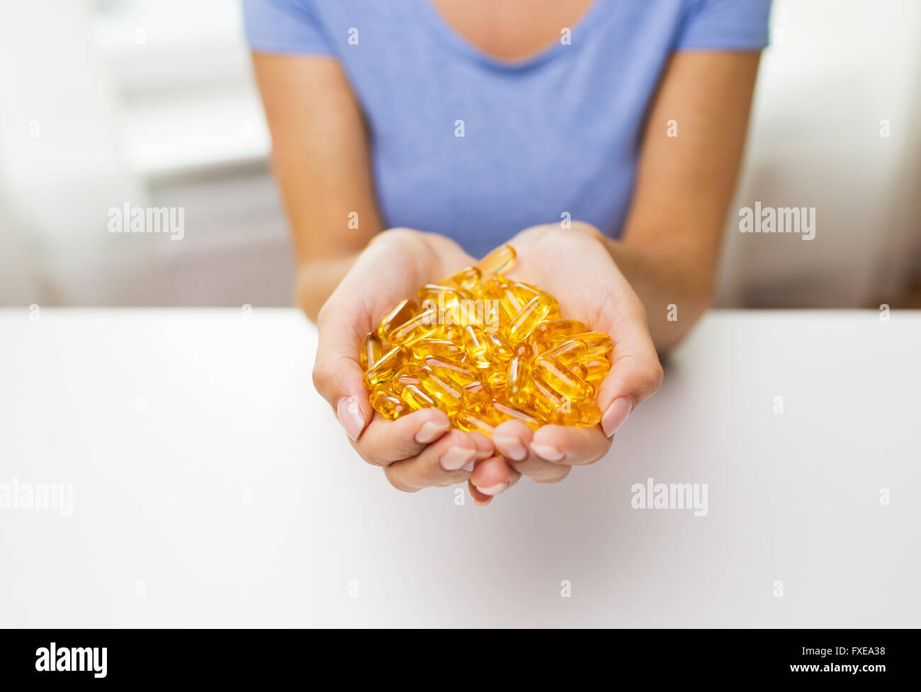 close up of woman hands holding pills or capsules Stock Photo - Alamy