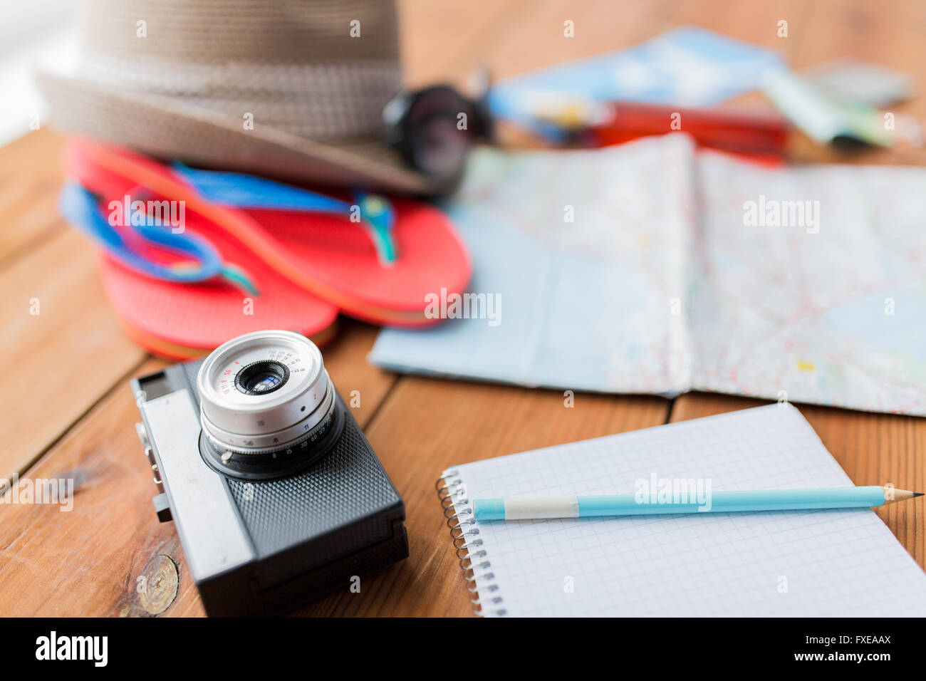 close up of camera, notepad and travel stuff Stock Photo - Alamy