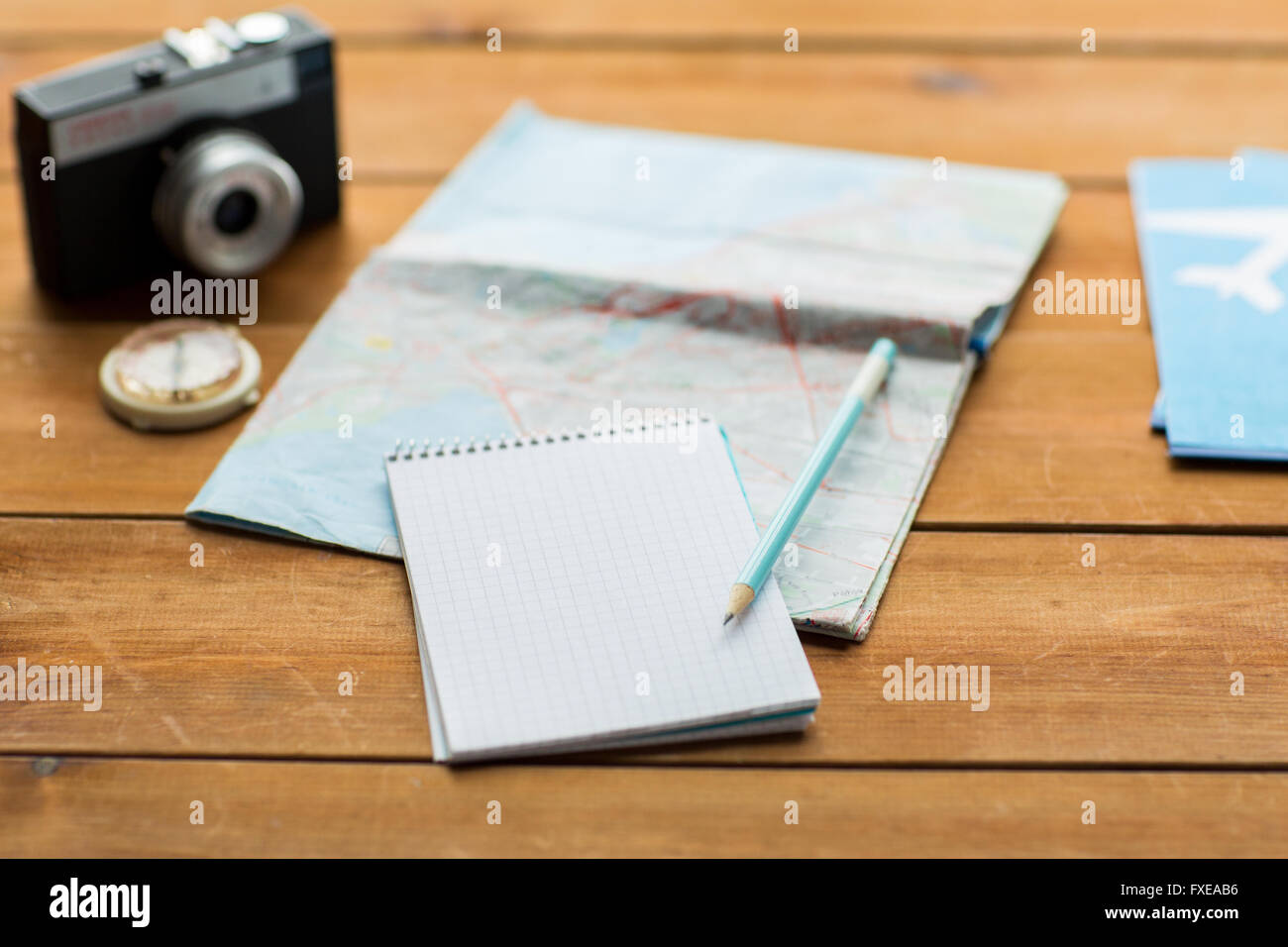 close up of notepad with map and travel tickets Stock Photo - Alamy