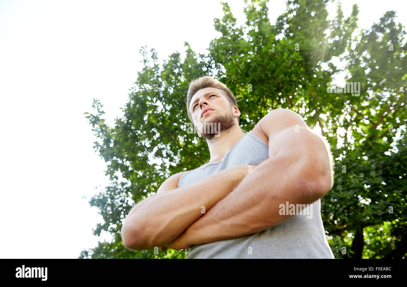 Sport man crossed arms hi-res stock photography and images - Alamy