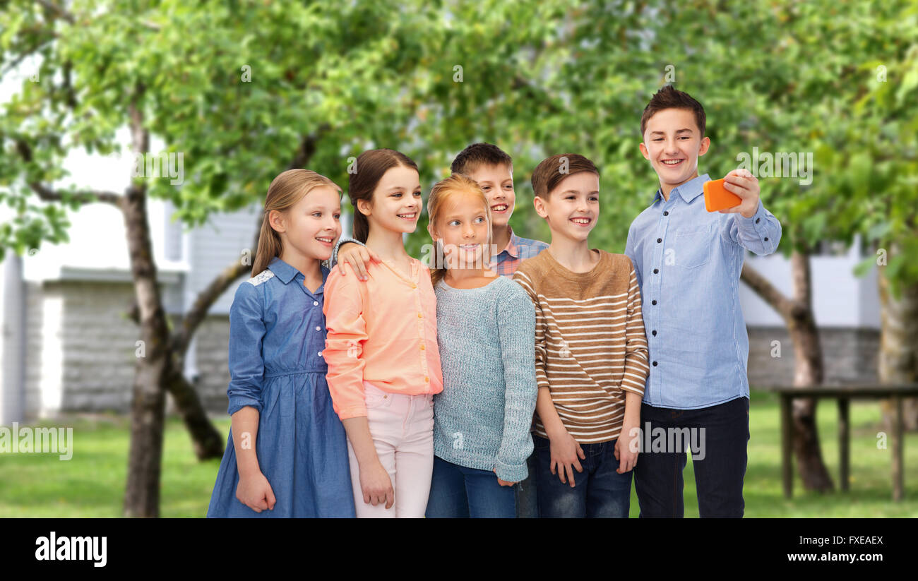 happy children talking selfie by smartphone Stock Photo - Alamy