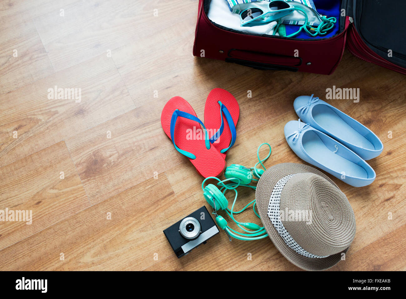 close up of travel bag with clothes and stuff Stock Photo - Alamy