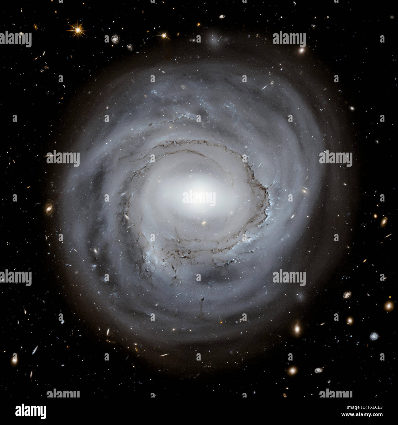 The galaxy system with a bright optical center Stock Photo - Alamy