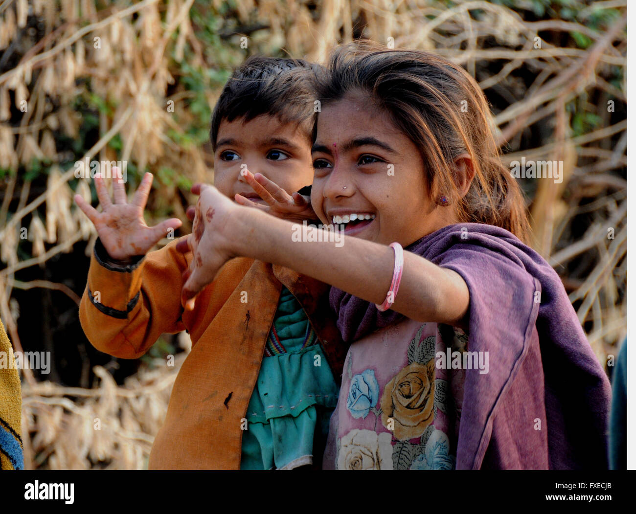 Children Waving