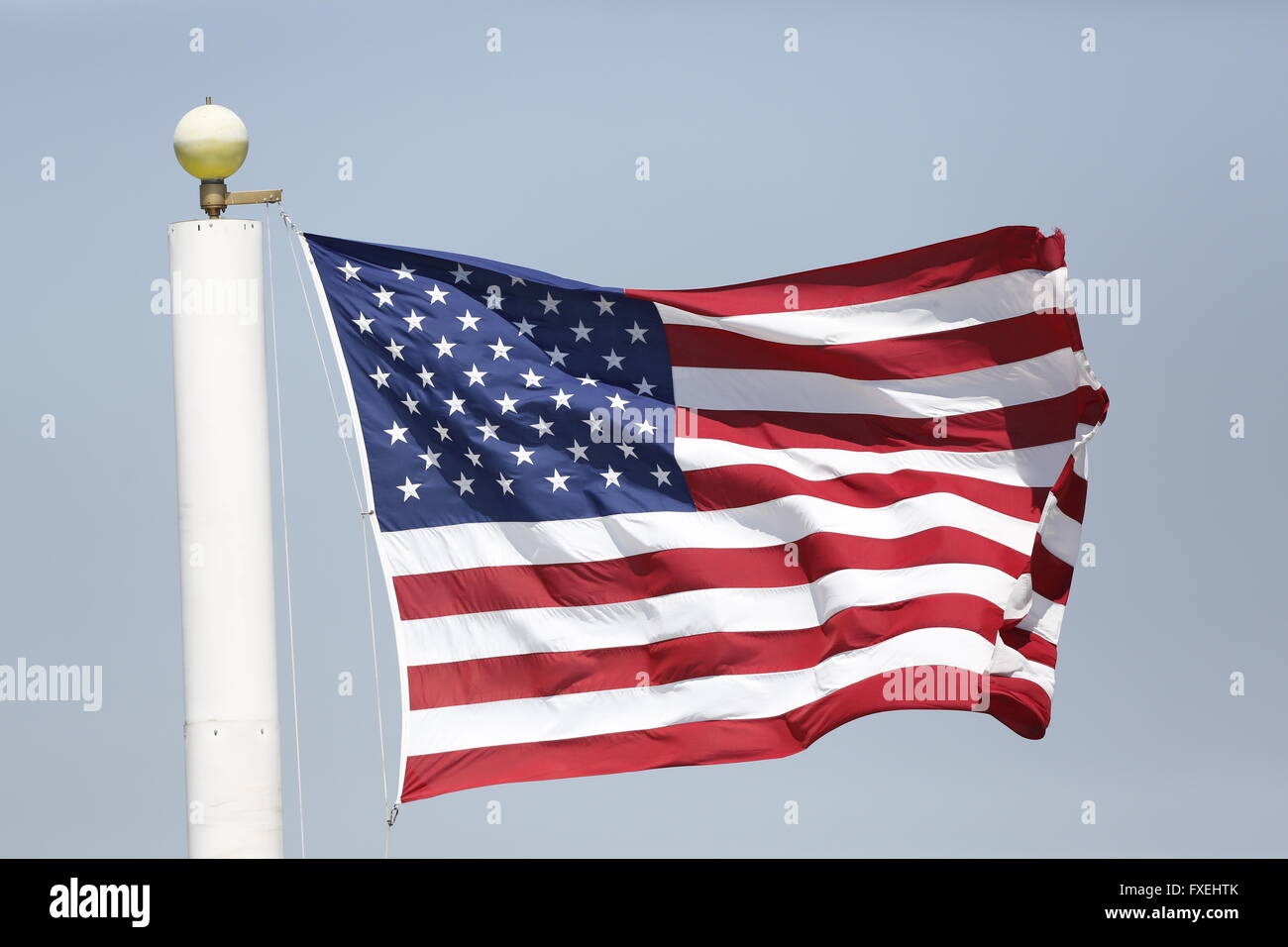 United States flag flying on cell phone pole at tennis stadium in ...