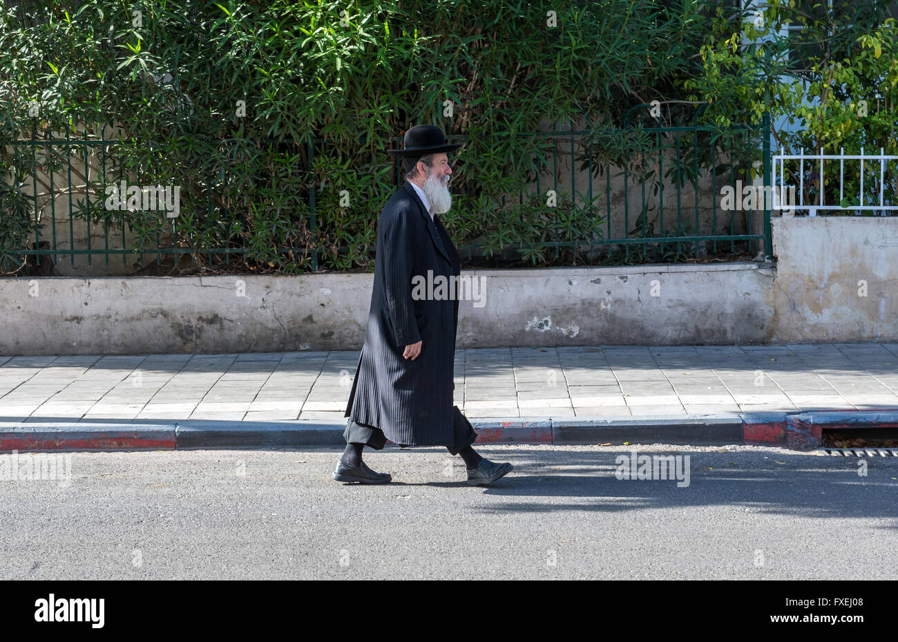 Man walking on street in Tel Aviv city, Israel Stock Photo - Alamy