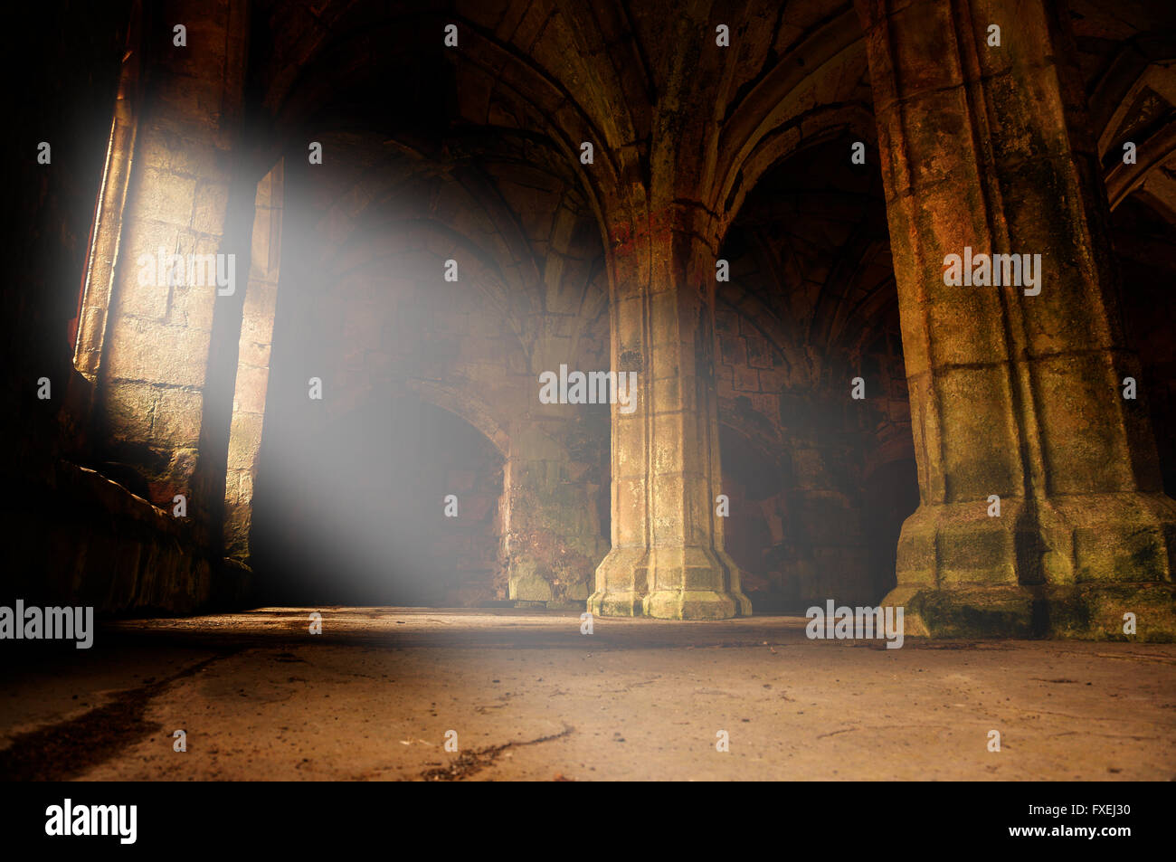 Abbey interior medieval ray of light Stock Photo - Alamy