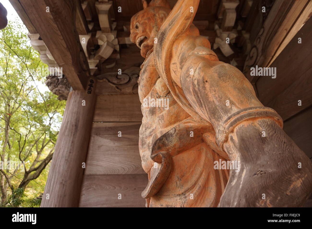 A wooden guardian statue at Daisho-in on Miyajima Island, Hiroshima ...