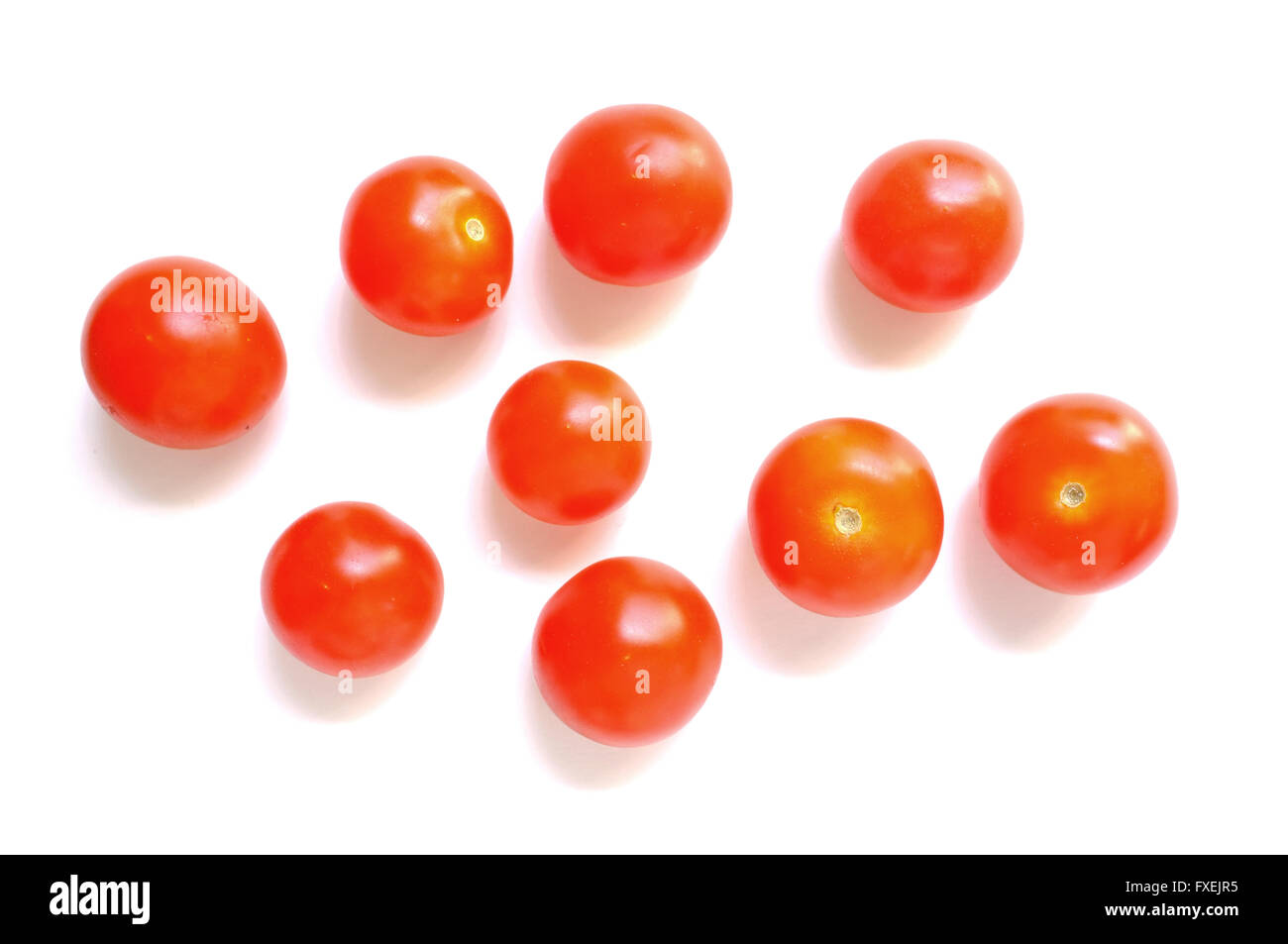 Loose cherry tomatoes photographed against a white background Stock ...