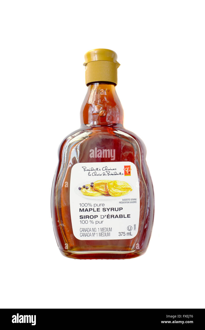 A bottle of Maple Syrup photographed against a white background Stock ...