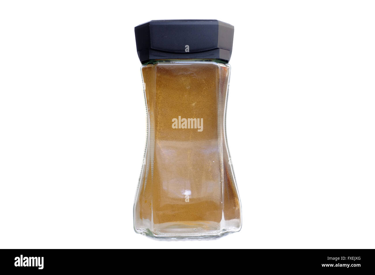 A jar of instant coffee without a label photographed against a white ...