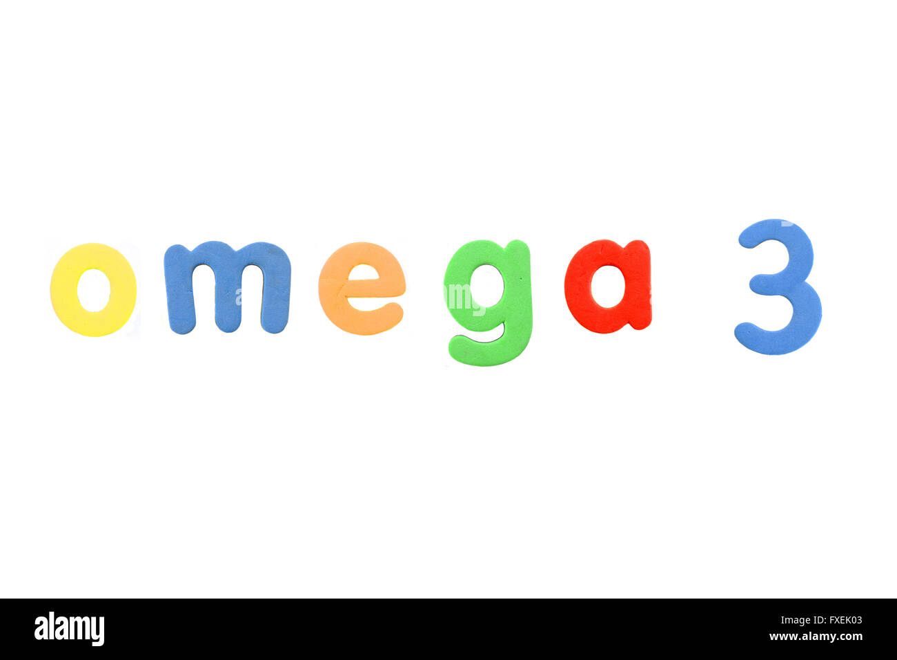 omega 3 written in fridge magnets photographed against a white ...