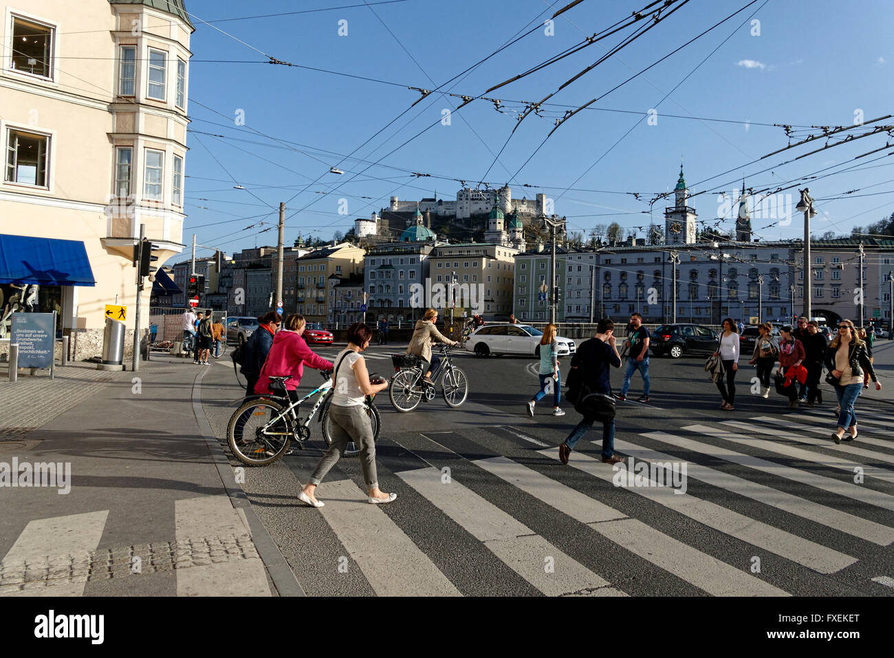 People on Zebra crossing at the Citizen-State Bridge, Salzburg, Austria ...