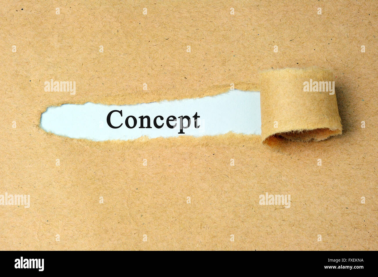 Ripped paper with "concept" text Stock Photo - Alamy