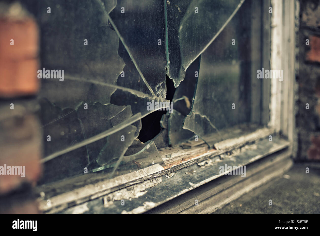 broken glass window reflecting clounding sky Stock Photo - Alamy