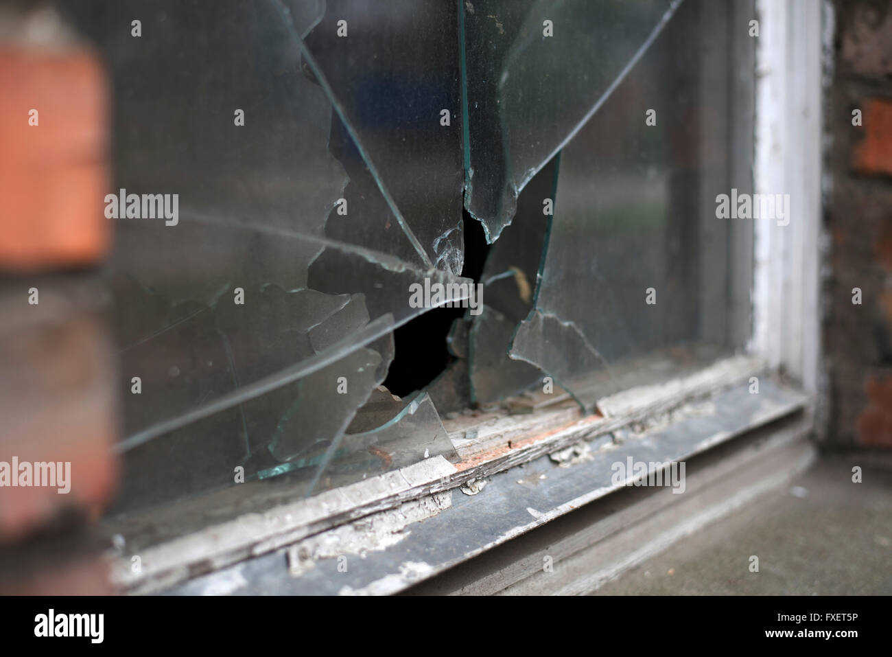 broken glass window reflecting clounding sky Stock Photo - Alamy