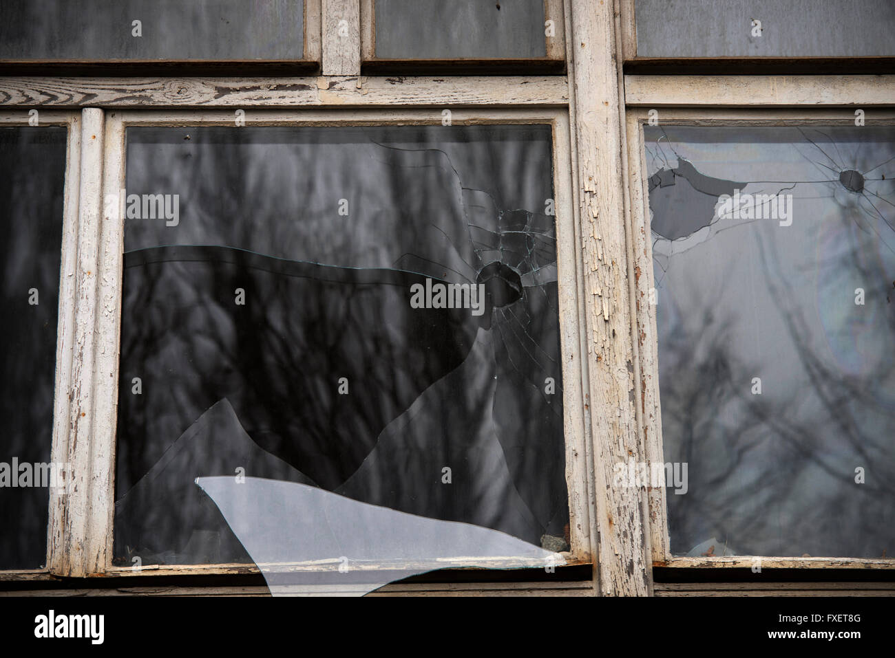 broken glass window reflecting clounding sky Stock Photo - Alamy