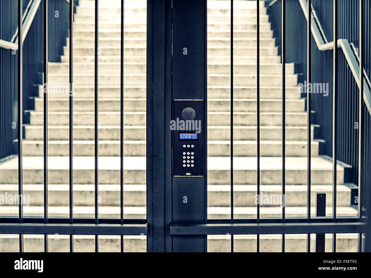 Close-up of building intercom and gate Stock Photo - Alamy