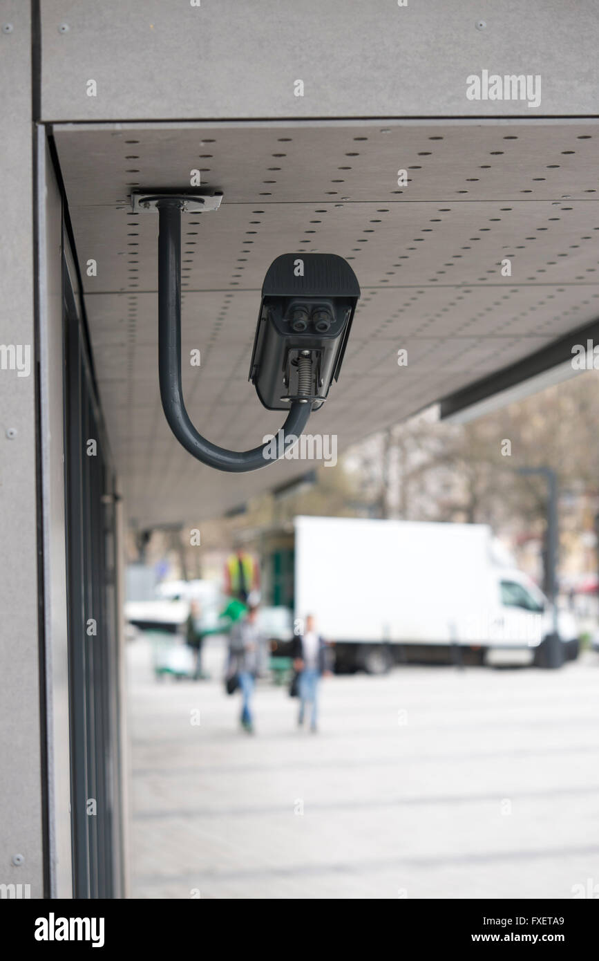 Security CCTV camera or surveillance system in building Stock Photo - Alamy