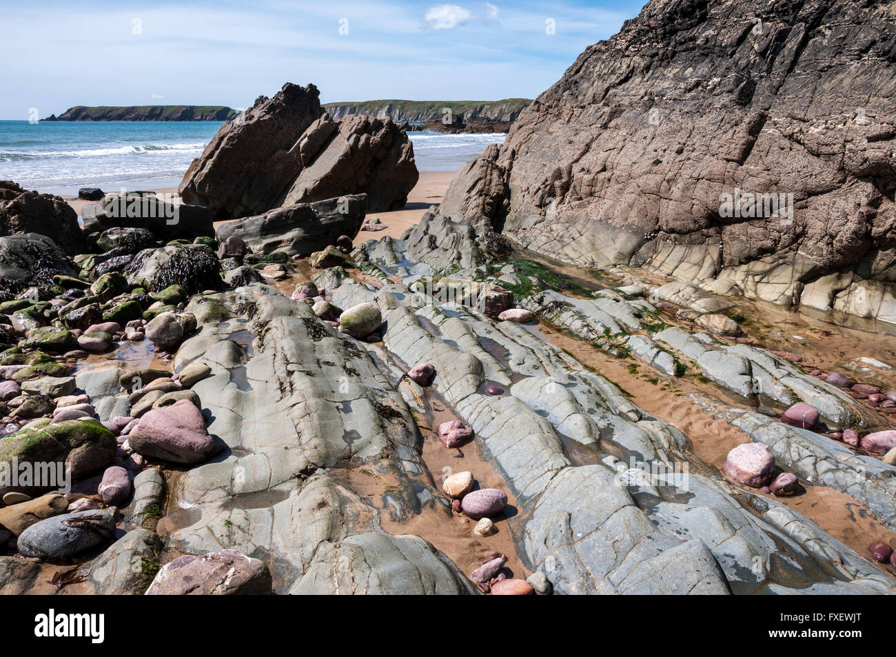 Coloured rocks at Marloes sands in Pembrokeshire, Wales. A popular ...