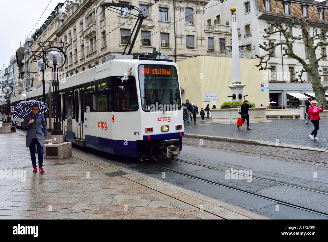 Electric tram or trolley-bus in the rain, Geneva, Switzerland Stock ...