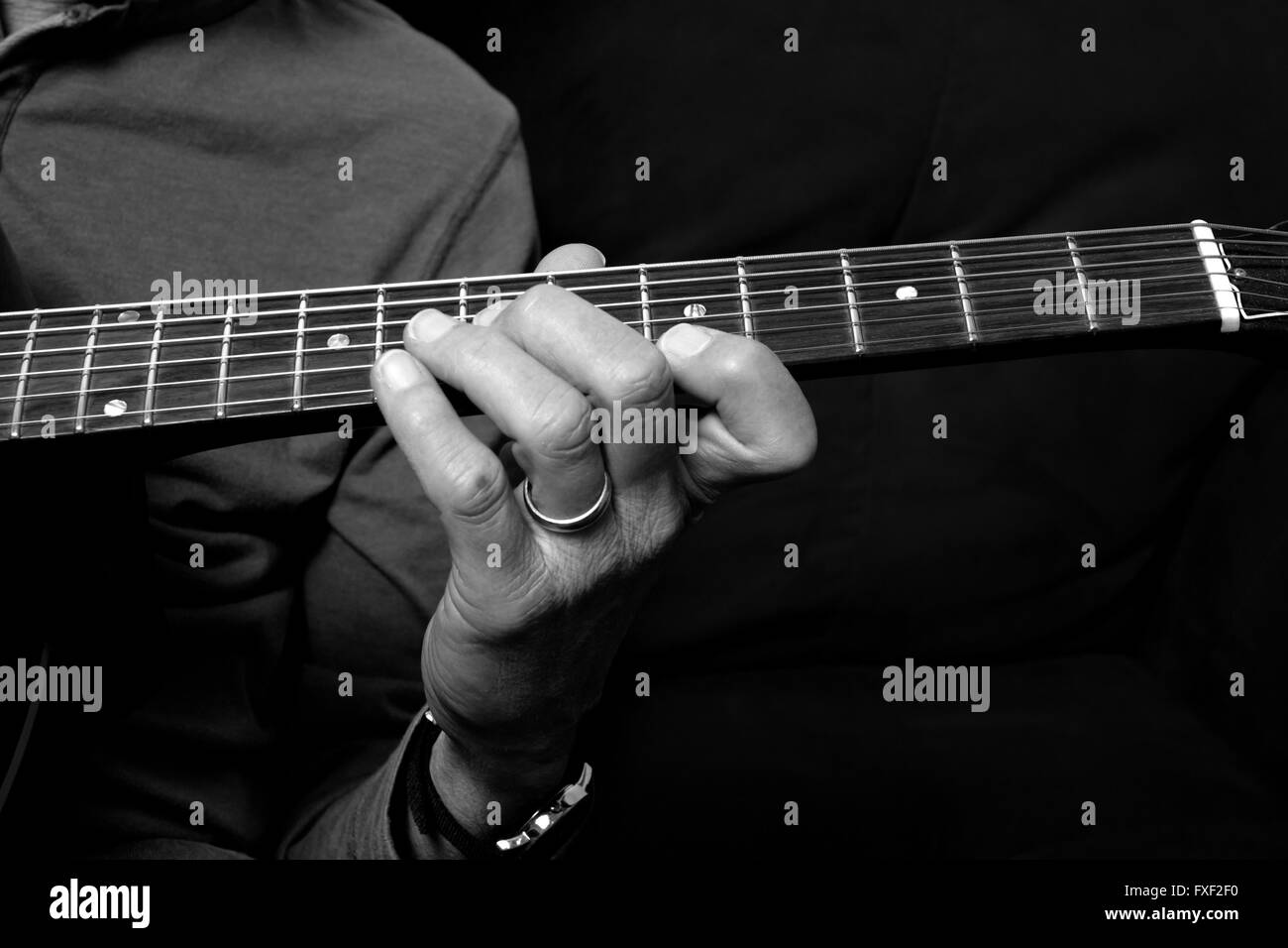 Practicing steel string guitar hi-res stock photography and images - Alamy