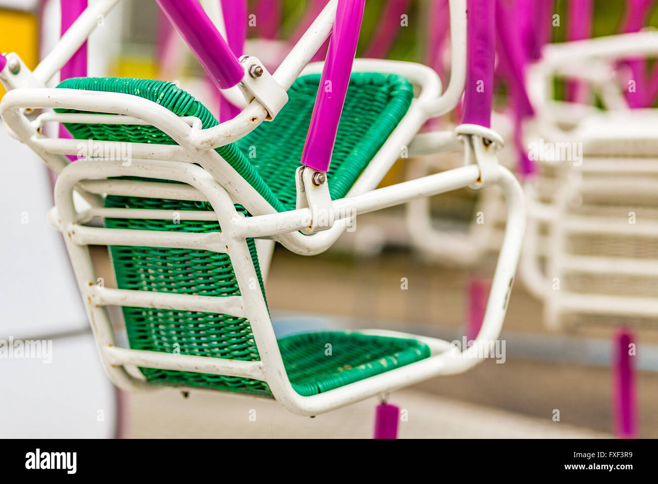 Closeup of carousel seats Stock Photo - Alamy