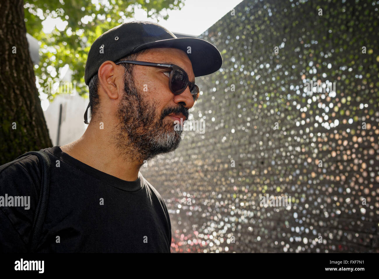 Indigenous artist Daniel Boyd is pictured with his artwork ‘Redfern ...