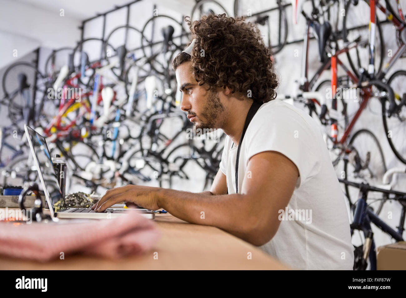 Worker using laptop Stock Photo - Alamy