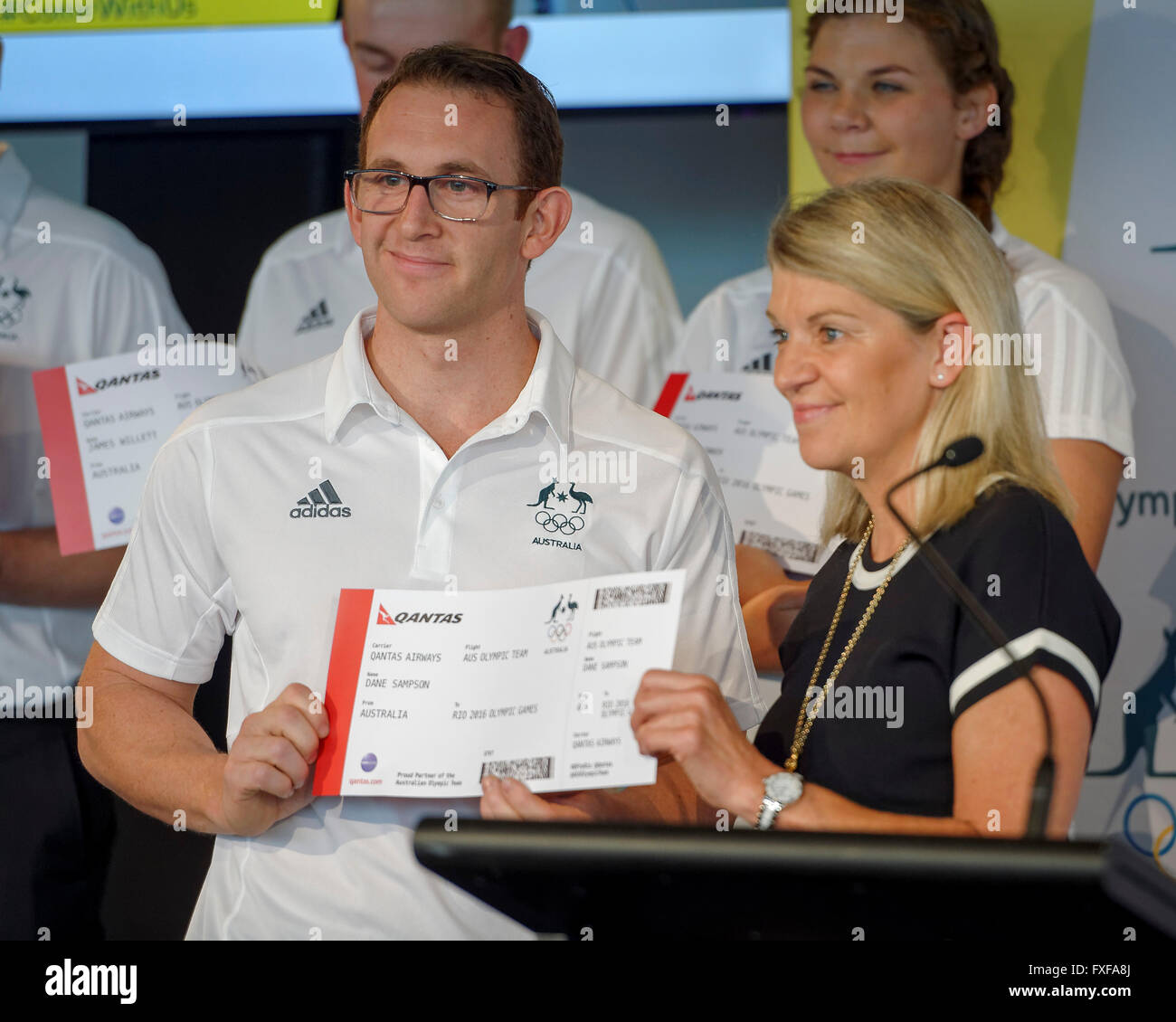 Dane Sampson receives his boarding pass for Rio from Chef de Mission of the 2016 Australian ...