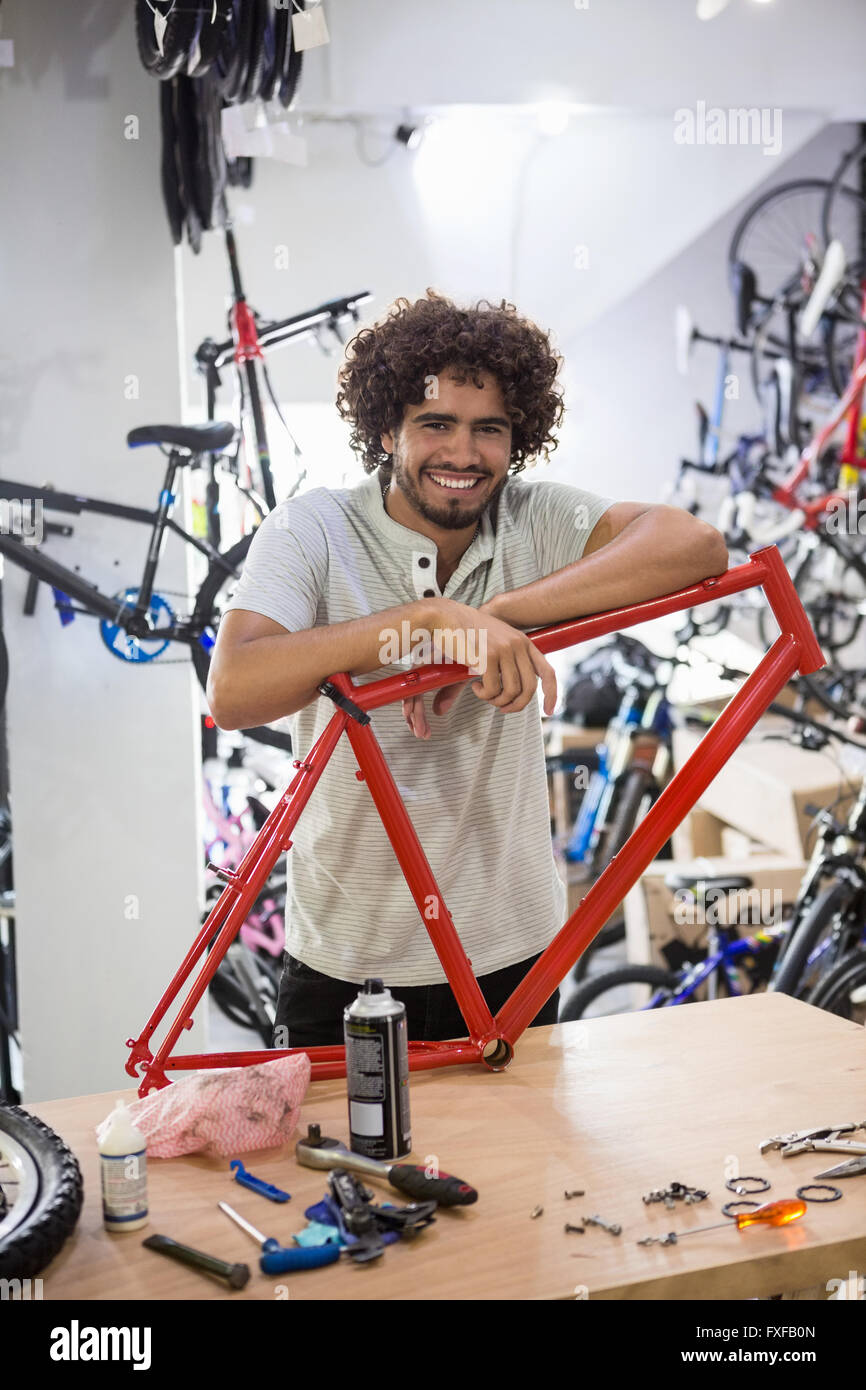 Worker repairing bicycles Stock Photo - Alamy