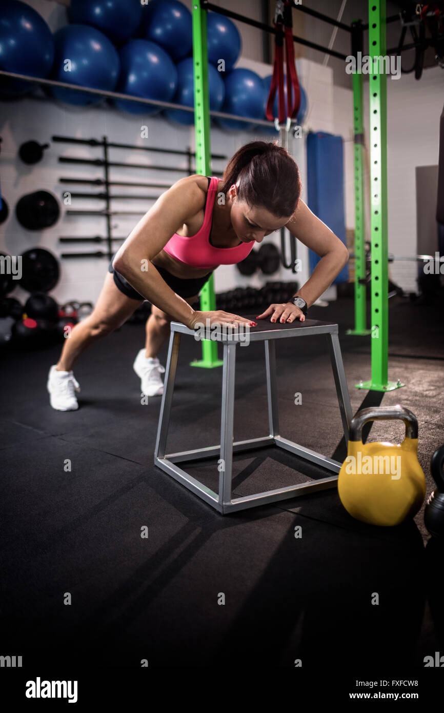 Woman doing push ups Stock Photo - Alamy