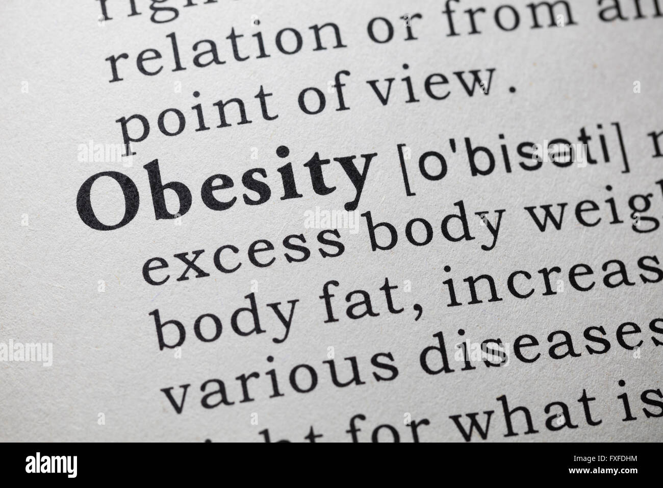 Fake Dictionary, Dictionary definition of the word obesity Stock Photo ...