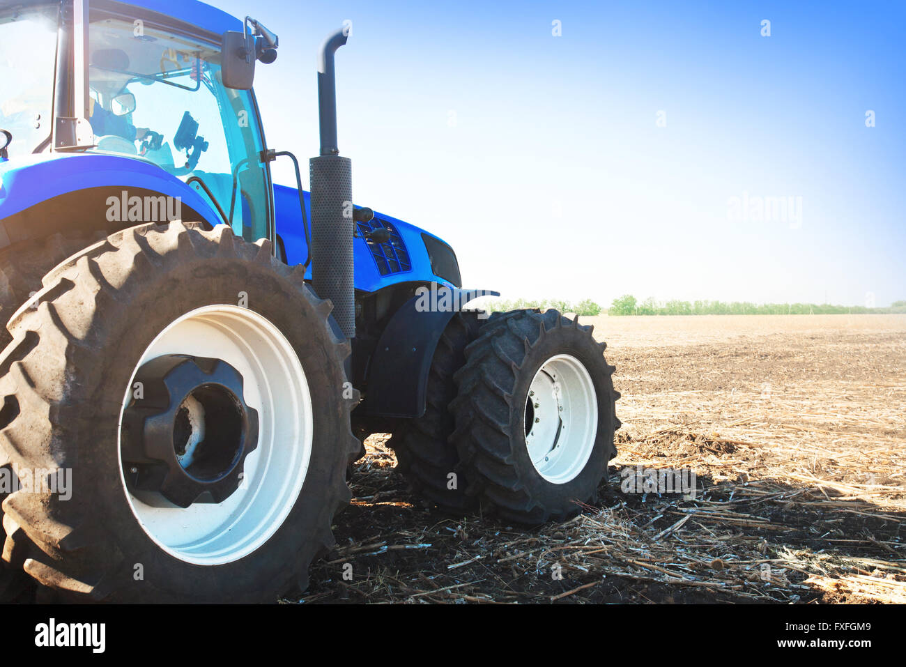 Bright blue tractor hi-res stock photography and images - Alamy
