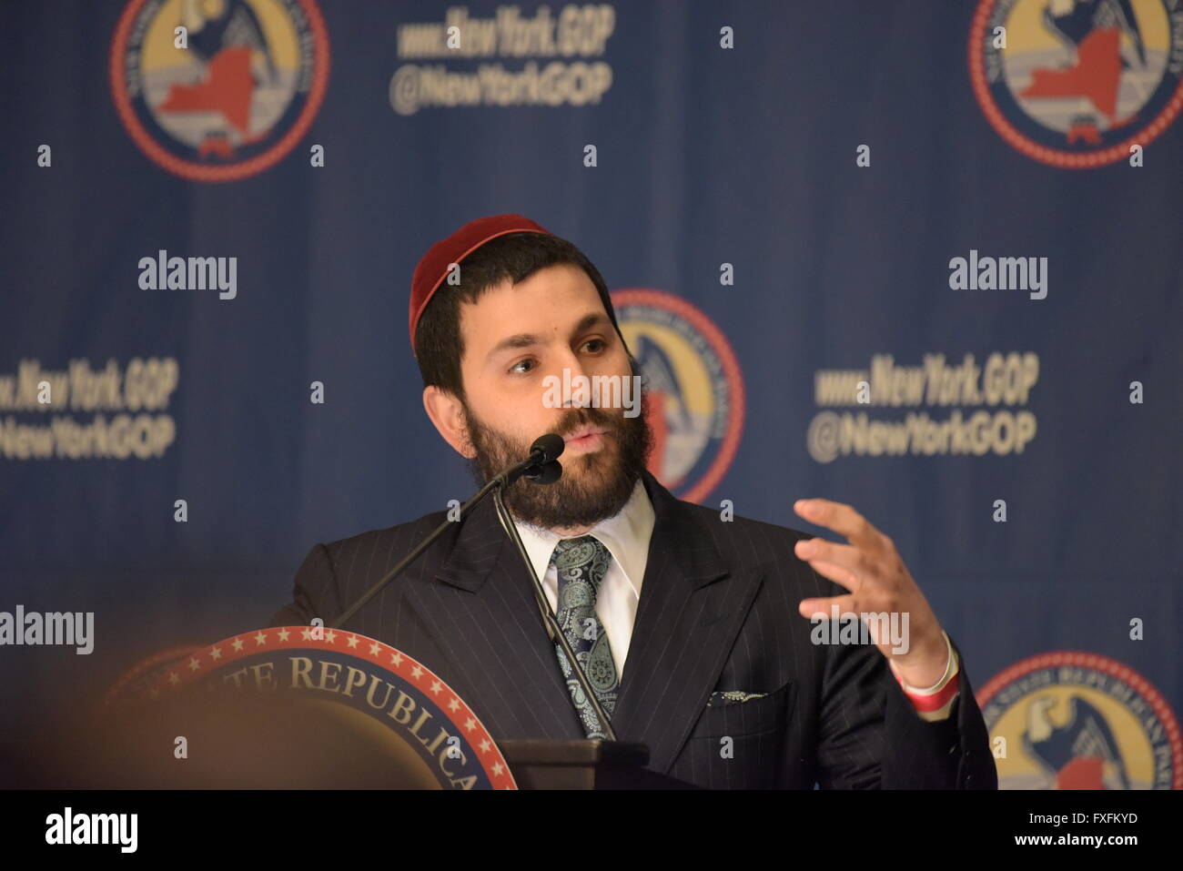 New York City, United States. 14th Apr, 2016. Rabbi opens session with ...