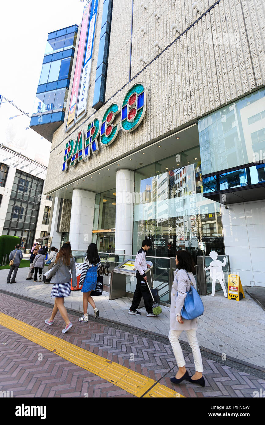 Pedestrians walk past the Shibuya Parco department store on April 15 ...