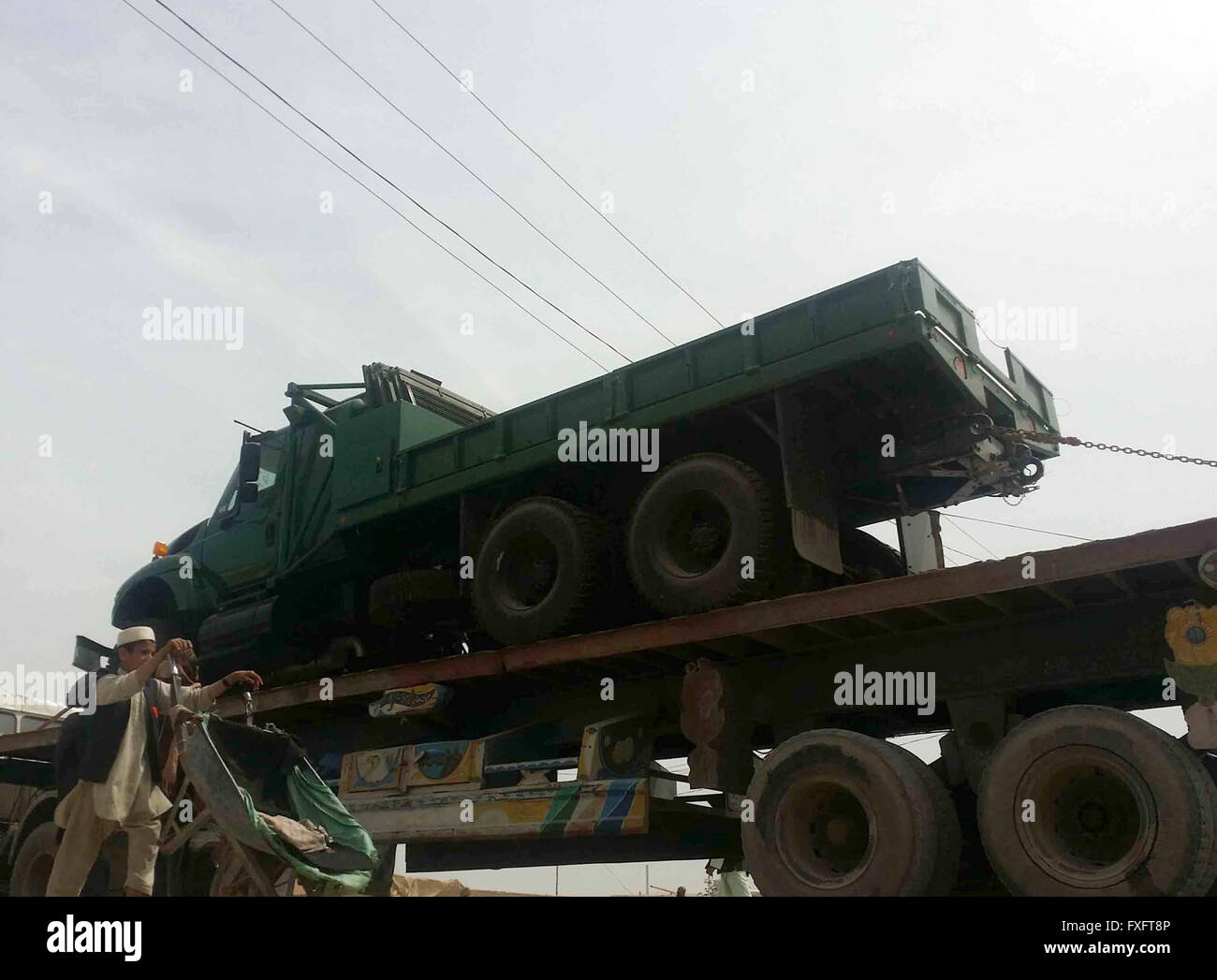 Pakistani trucks carry the vehicle used as logistic supply for the NATO ...