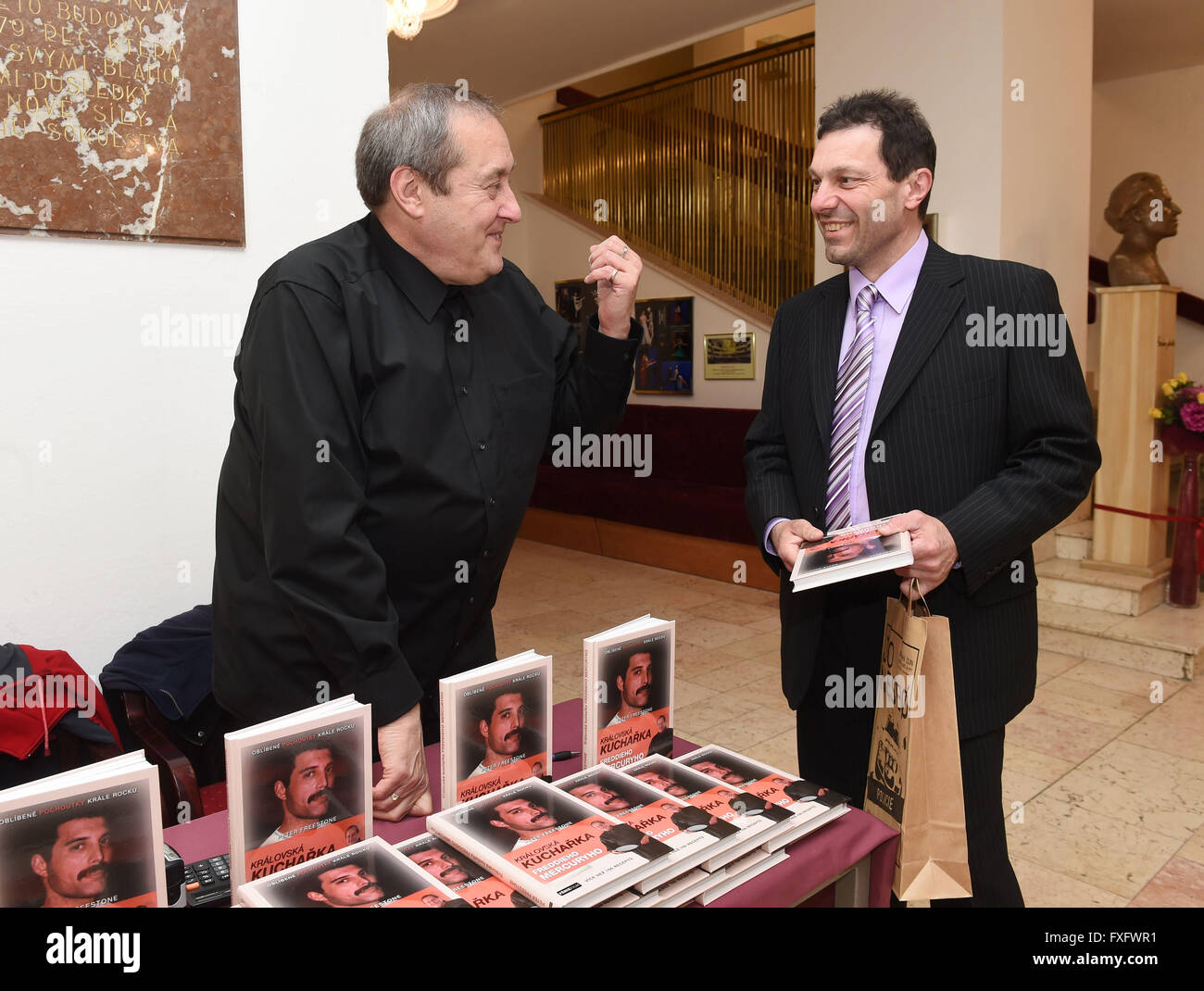 Olomouc, Czech Republic. 15th Apr, 2016. Peter Freestone, left, signs ...