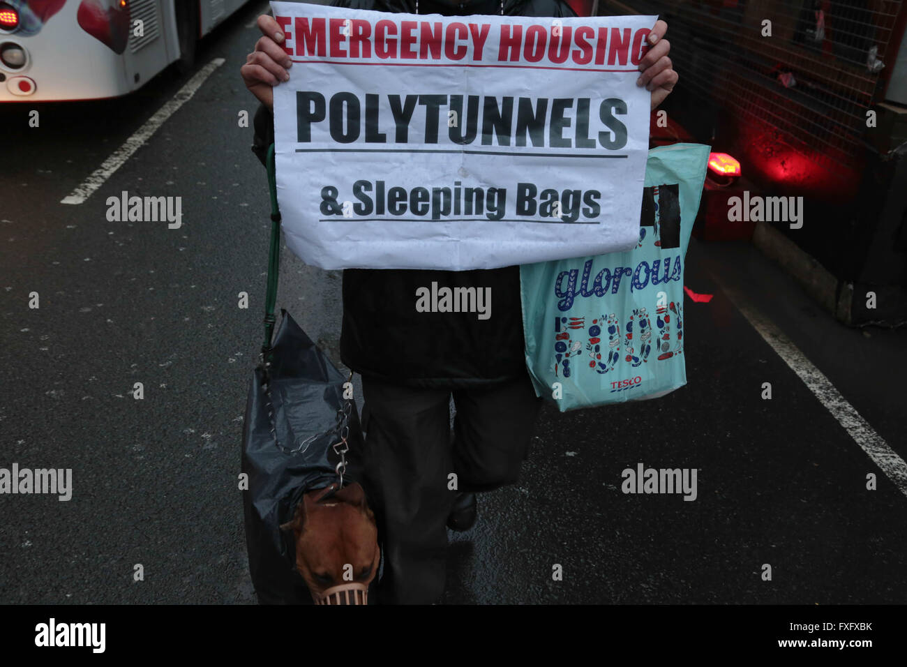 London, UK. 15th Apr, 2016. A Man holds a banner in solidarity with ...