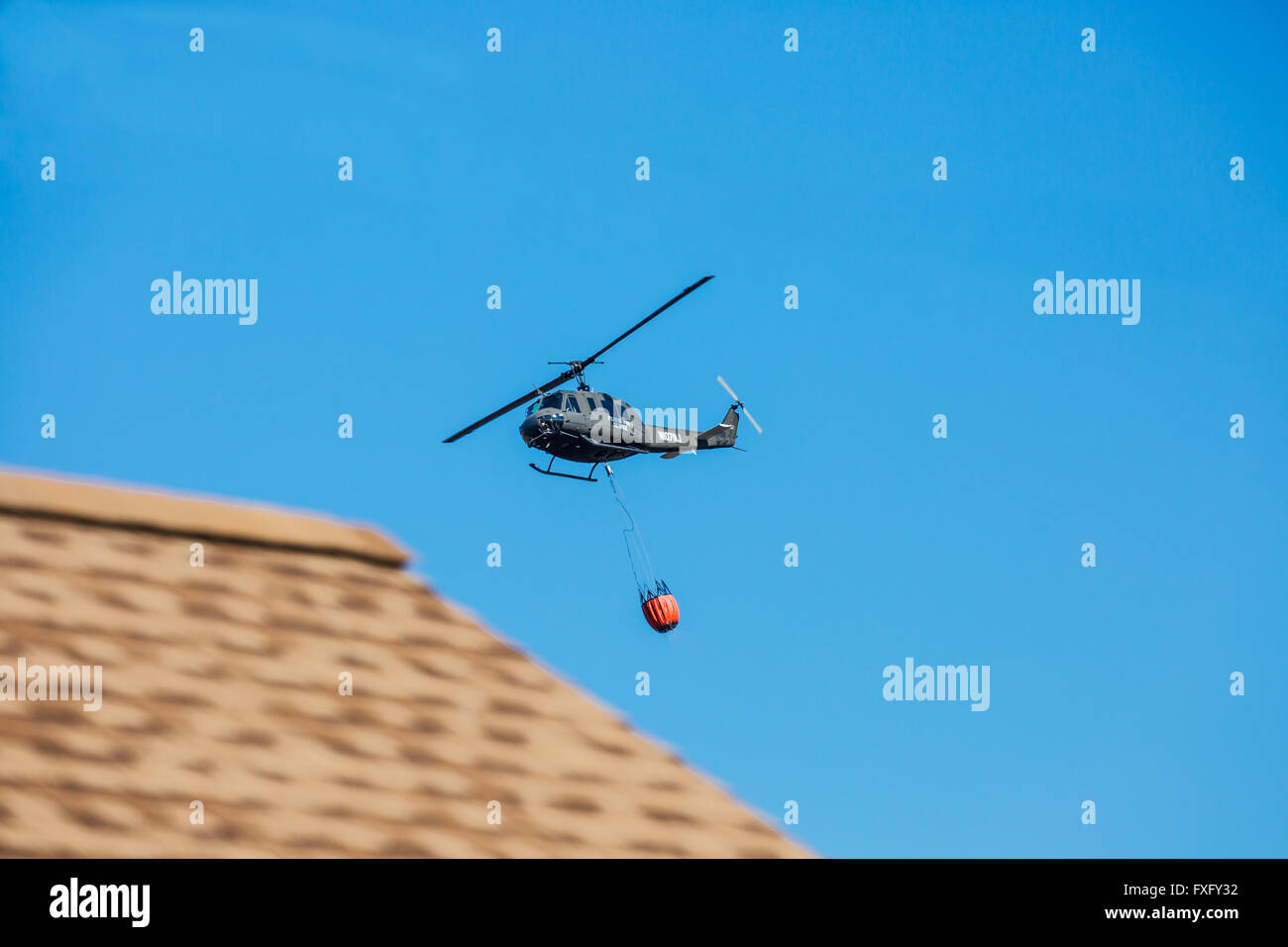 Fire Forest Service helicopter collecting water from the Raritan Bay ...