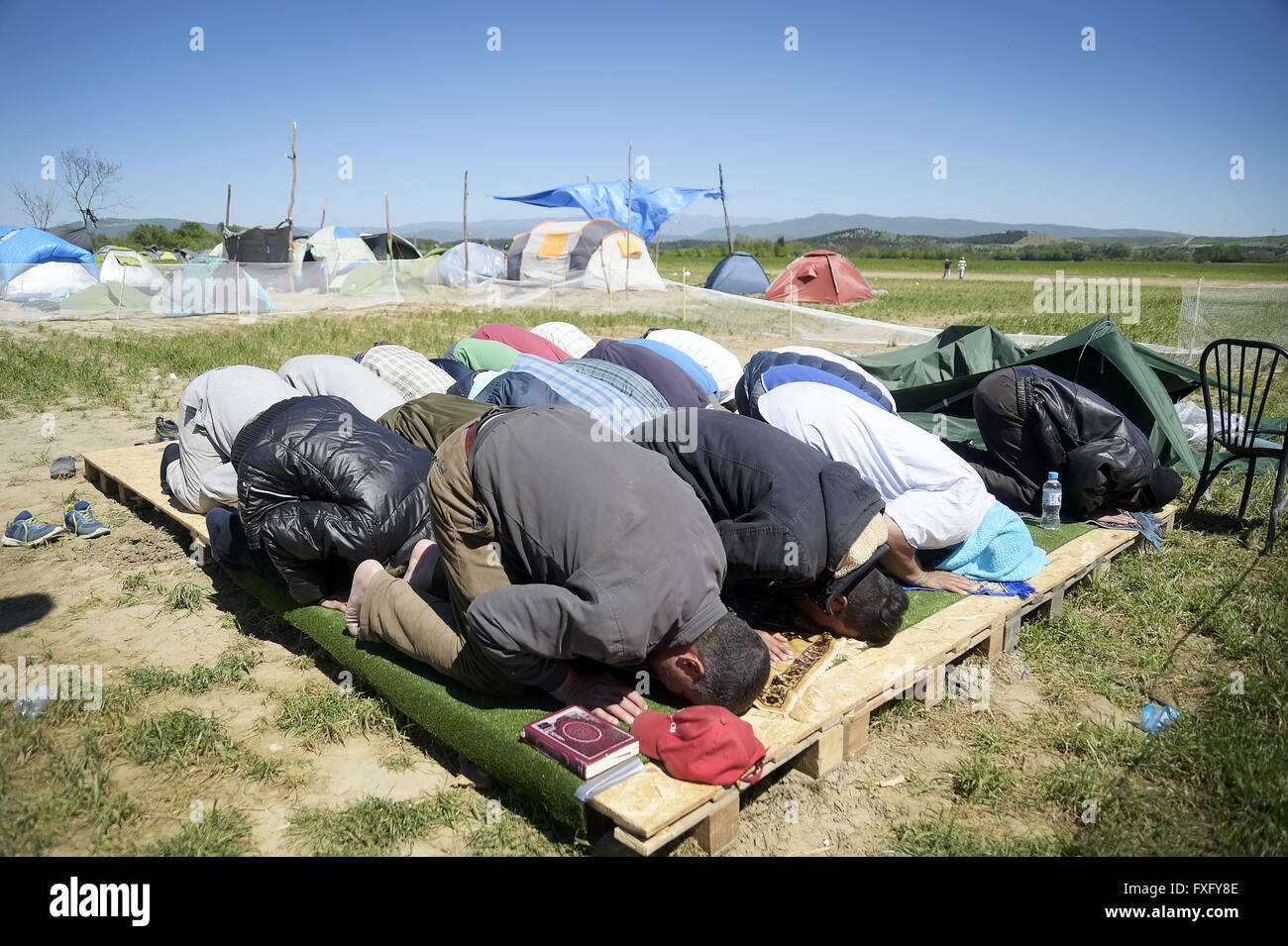 Gevgelija, Greece. 15th Apr, 2016. Migrants pray inside a small ...