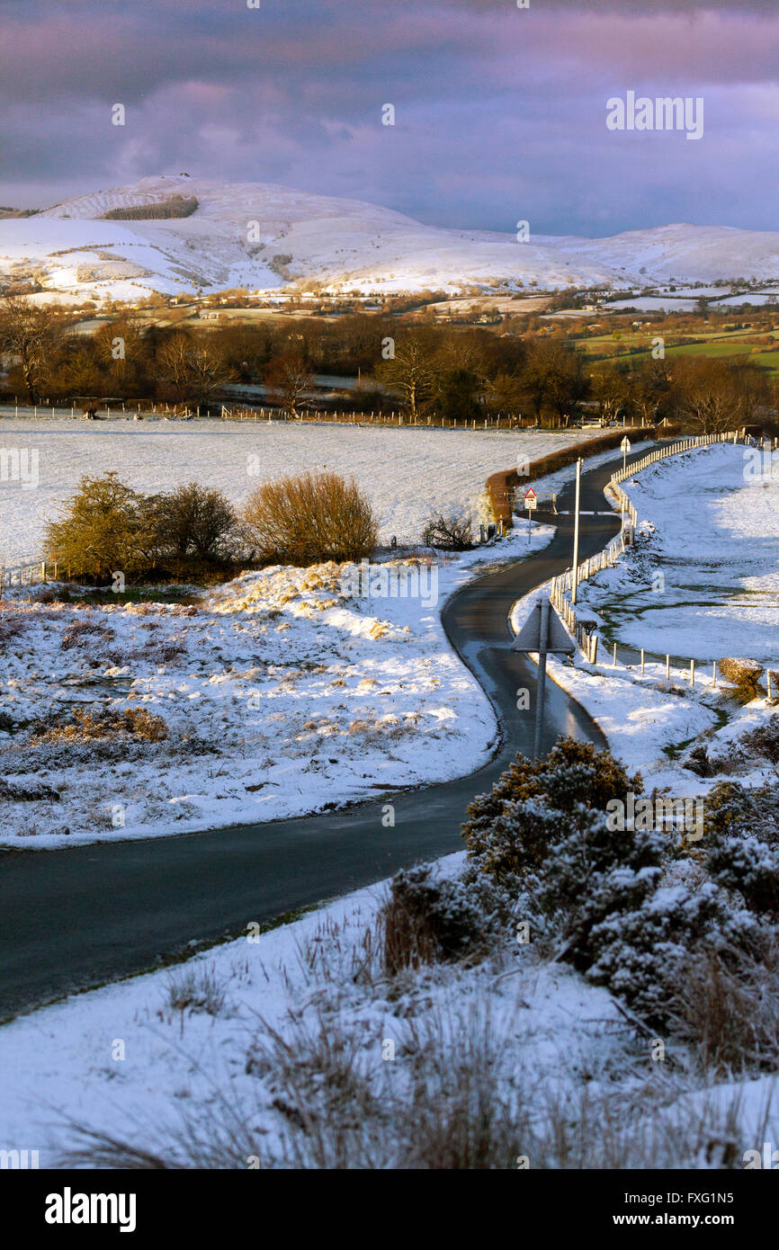 A beautiful snow covered landscape in rural Flinthsire with a windy ...