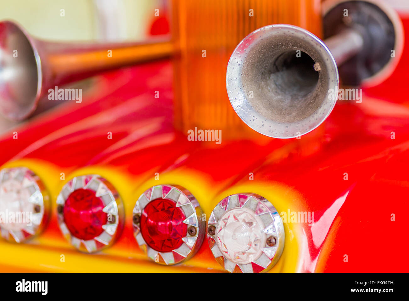 close up of merry-go-round seats, trumpet of fire truck Stock Photo - Alamy